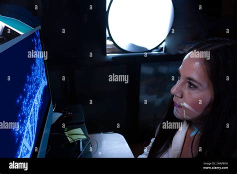 Woman Doctor Works On Human Dna Analysis With Computer Simulation Aids Woman Doctor Works On Human Dna Analysis With Computer Simulation Aids