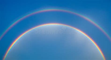 A Bright Blue Sky Features A Prominent Double Rainbow The Primary Rainbow Stock Illustration