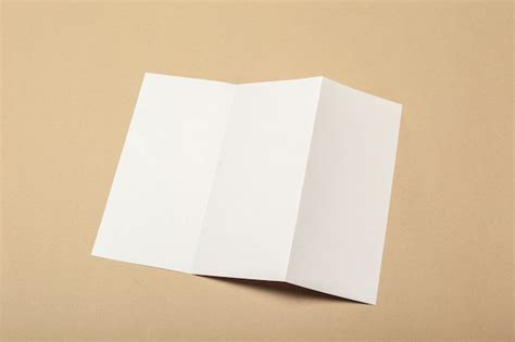 Premium Photo Blank Paper Pieces For Mock Up On A Beige Background