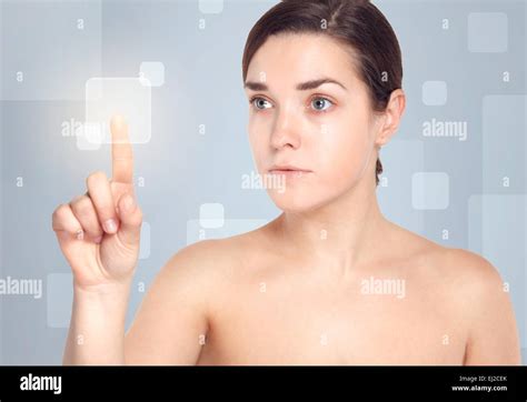 Beautiful Woman Touching Button Or Touchscreen Stock Photo Alamy