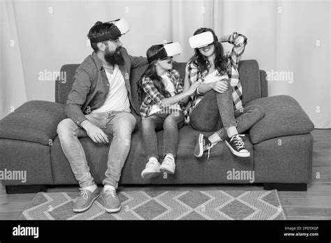 Happy Parents With Kid Girl Use Modern Technology Mom Dad And Daughter Stock Photo Alamy