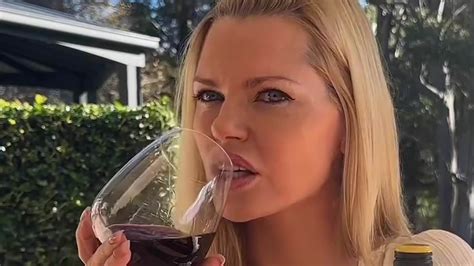 No One Is Looking At The Red Sophie Monk Shows Off Her Very Ample Cleavage As She Spruiks