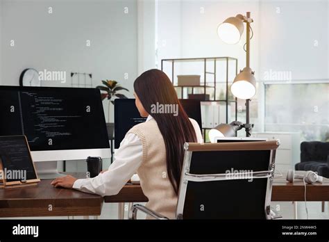Programmer Working At Desk In Modern Office Stock Photo Alamy