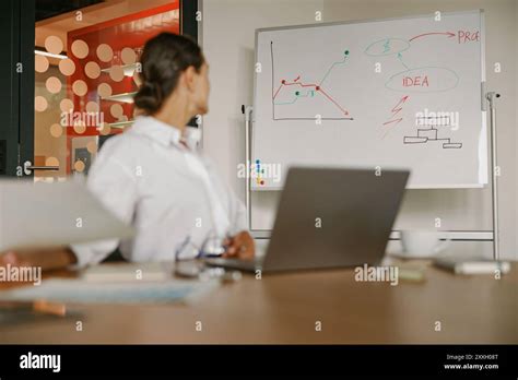 Engaging Business Presentation Featuring Comprehensive Data Visualization In The Office Setting