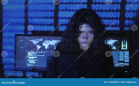 Woman Hacker Programmer With Curly Hair Is Working On Computer In Cyber Security Center Filled