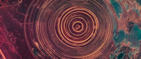 Abstract Landscape Inspired By Satellite Imagery Showcasing Vibrant Dynamic Patterns Premium