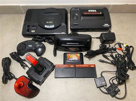 2 Sega Master System 2 & Mega Drive - Console with games - Catawiki