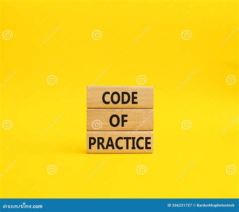 Code Of Practice Symbol Concept Word Code Of Practice On Wooden Blocks Beautiful Yellow