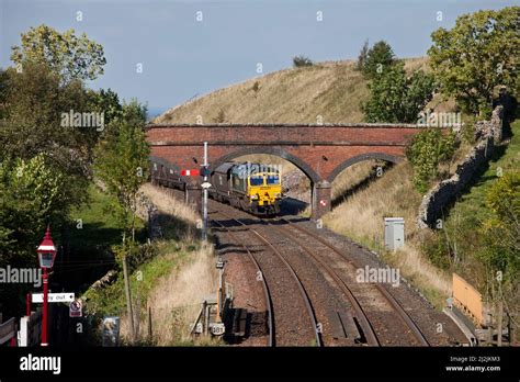 Freightliner Class 66 Diesel Locomotive 66547 Hauling A Merry Go Round