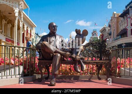Statues Of Roy Disney With Minnie Mouse On Park Bench At Walt Disney