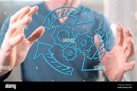 Business Dynamic Concept Between Hands Of A Man In Background Stock