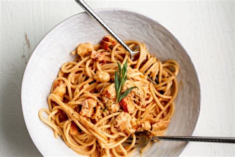 Creamy Lobster Pasta Cooking With Cocktail Rings