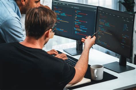 It Developers Discussing Online Software Development Information