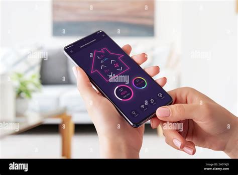 Modern Smart Home Control App On Smart Phone Concept Woman Holding
