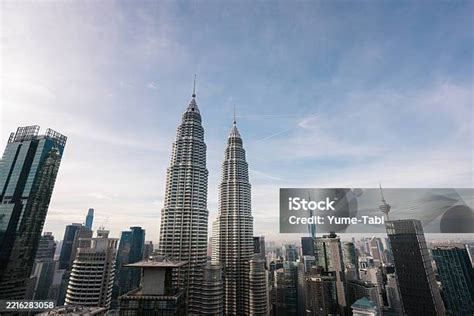 Kuala Lumpur Skyline With The Iconic Petronas Twin Towers And