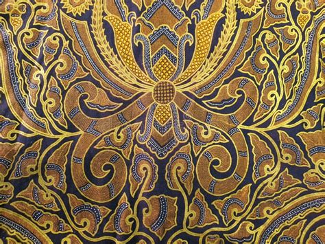 Batik With Abstract Patterns With Gold Color As The Primary Color