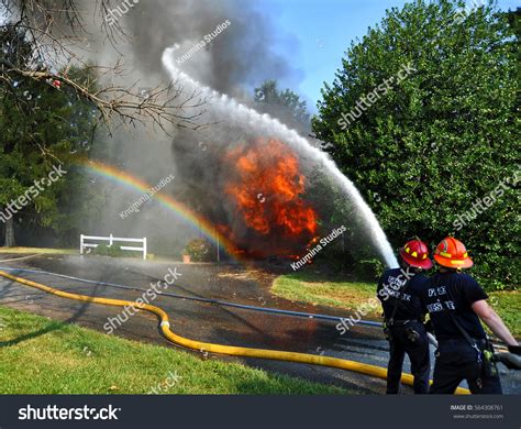 Firefighter Hose Spraying