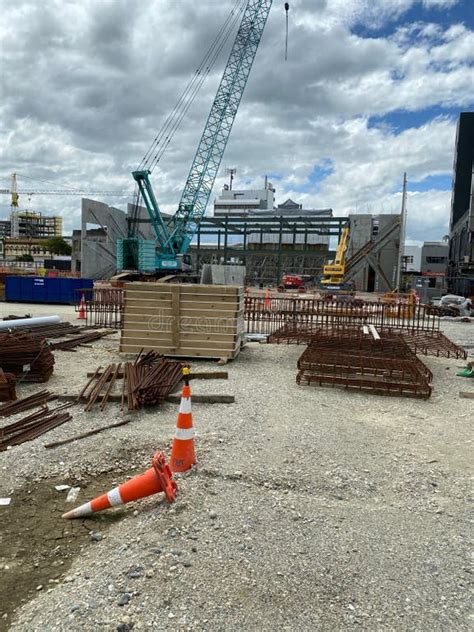 Photo Of A Mobile Crane With Outriggers In Construction Site In