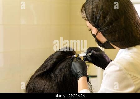 Esthetician Uses Thin Needle To Inject Platelet Rich Plasma In Scalp Plasma Lift Treatment