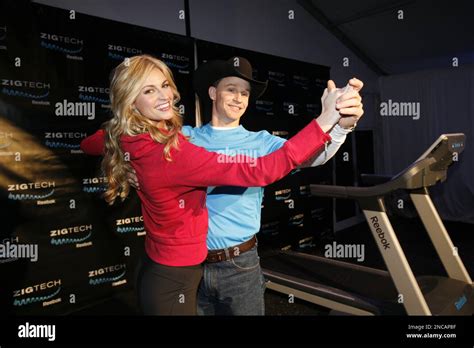 Sports Reporter Erin Andrews Left And Rodeo Champion Ty Murray Right