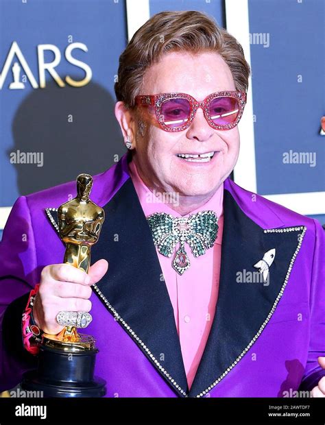 Hollywood Ca February 9 Elton John Poses In The Press Room During