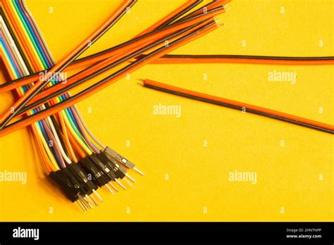 Colorful Wires Isolated On Yellow Background Connection Wire For