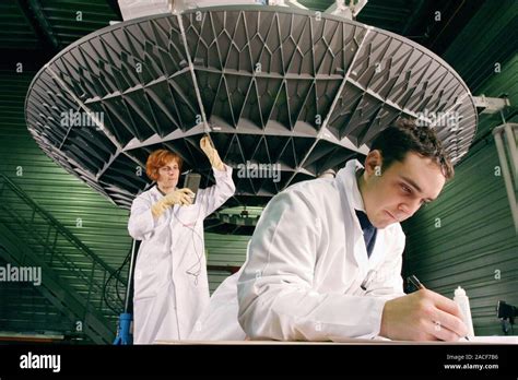 Herschel Space Observatory Construction Engineers Working On The 3 5 Metre Wide Mirror In