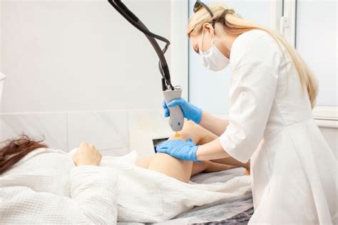 Premium Photo Leg Hair Removal With Alexandrite Laser Woman Client In