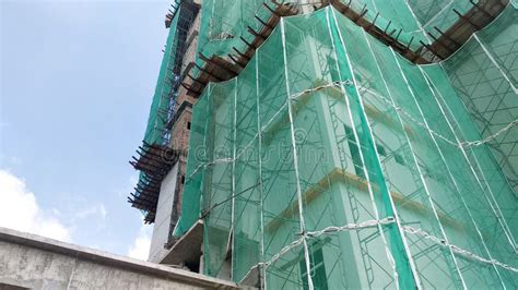 Safety Netting Is Installed At The High Rise Building Exterior