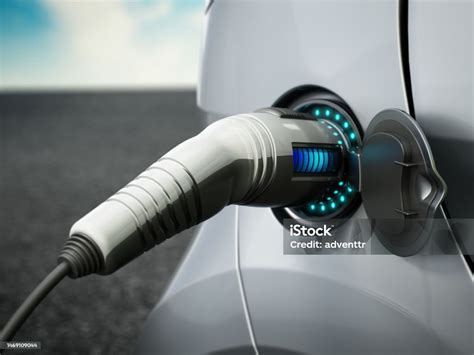 충전 배터리 스테이션을 사용하여 최신 충전기로 충전되는 전기 자동차 지속 가능하고 환경 친화적인 에너지 개념 0명에 대한 스톡 사진 및 기타 이미지 Istock