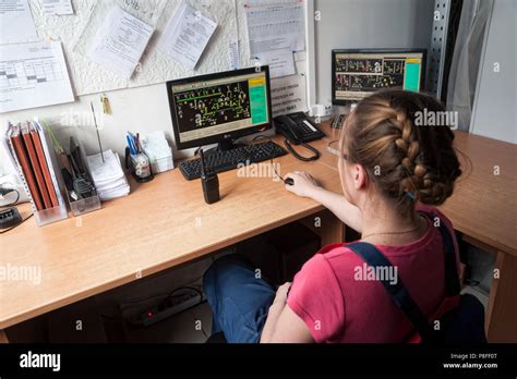 Female Engineer Working In Monitoring Room Stock Photo Alamy