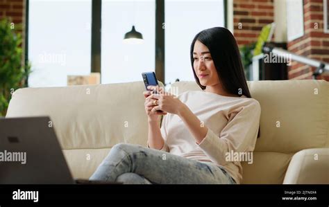 Happy Freelancer Answering Client Email On Smartphone While Working From Home Worker Doing