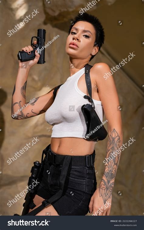 Low Angle View Tattooed Sexy Archaeologist Stock Photo 2222266127 Shutterstock