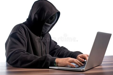 Man In Black Hoodie Sits Isolated In Dark Room Surrounded By Computer