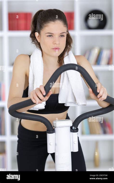 Girl Exercising On Stepper Trainer Stock Photo Alamy