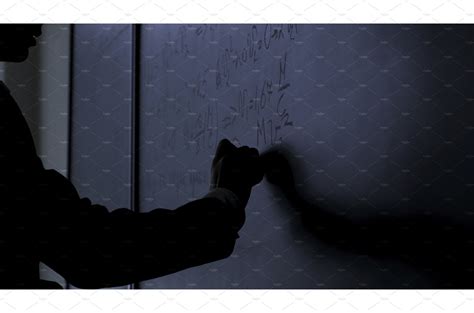 Scientist Writing Formulas On Graphics ~ Creative Market