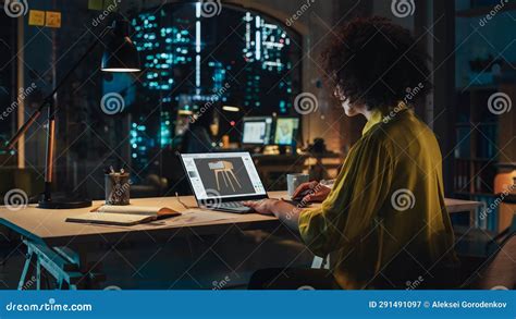 Creative Multiethnic Female Working On Laptop Computer With An Interior Design Software Display
