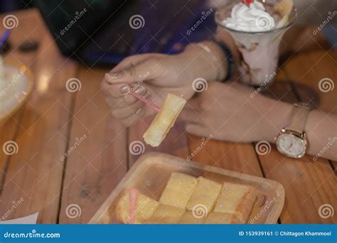 Beautiful Girl Sitting To Eat Ice Cream In The Shop Stock Image Image