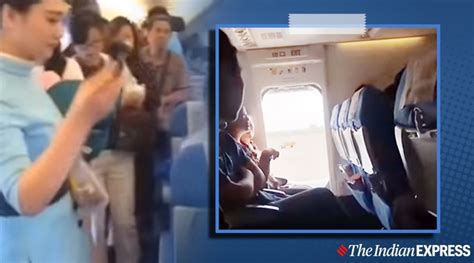 Watch Chinese Woman Opens Plane Emergency Door For Fresh Air Delays