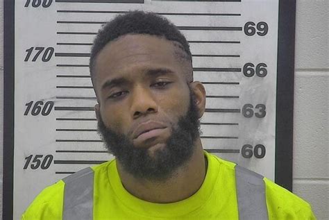 Report Combative Convicted Felon Jailed After Officers Find Large