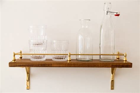 Diy Brass Rail Gallery Shelf That Radiates Charm