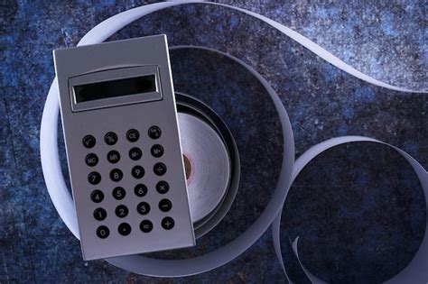 Premium Photo Directly Above Calculator And Roll Of Adding Machine Tape