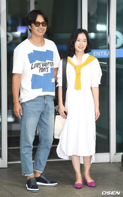 [사진]윤상현 메이비 부부 공항패션