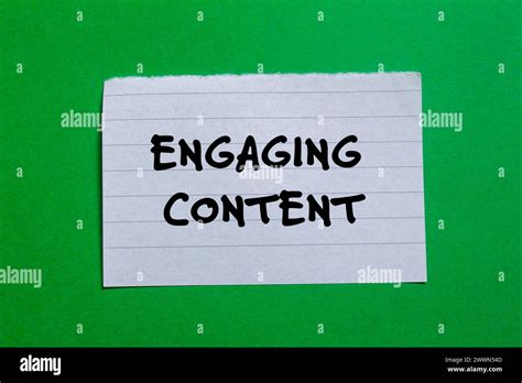 Engaging Content Words Written On Torn Paper Piece With Green Background Conceptual Symbol