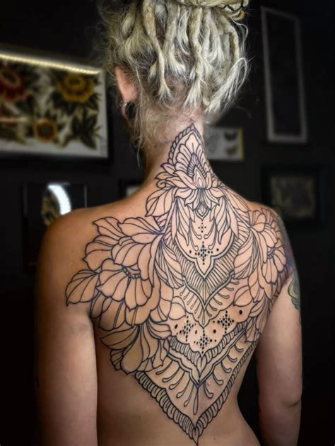 Elegant Ornamental Back Tattoo