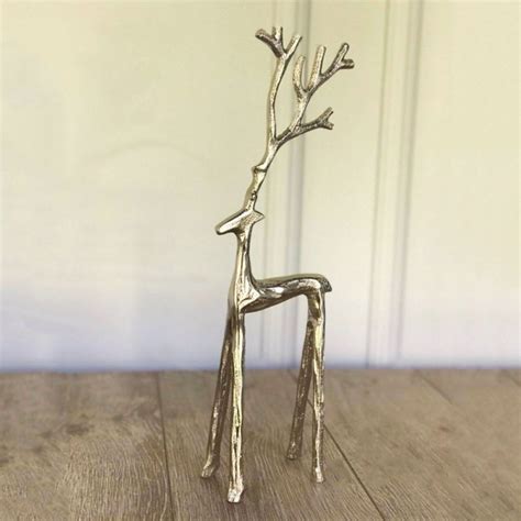 Декоративна настільна статуетка Олень золотий 38x13x7см фото відгуки характеристики в