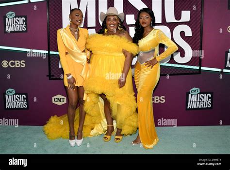 Trea Swindle From Left Danica Hart And Devynn Hart Of Chapel Hart Arrive At The Cmt Music