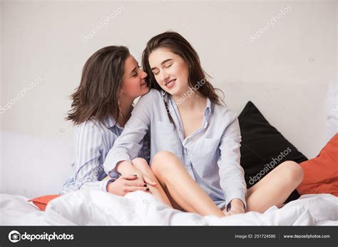 Girls Have Cuddles Soft Touch Each Other In Bed Stock Photo