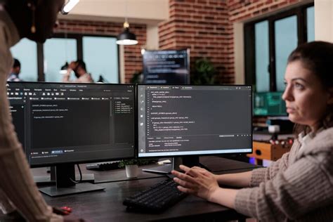 premium photo programmers looking for source of cyber attacks and