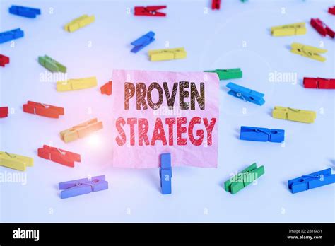 Conceptual Hand Writing Showing Proven Strategy Concept Meaning